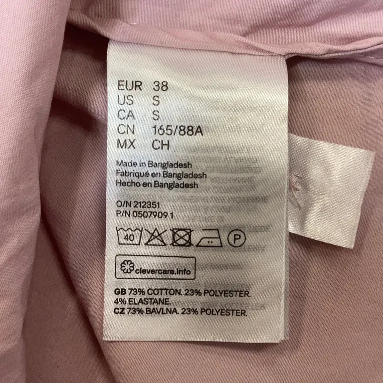 Skjorta (Rosa) från H&M Polyester, Elastan, Bomull - Materialetikett